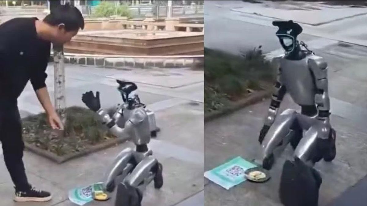 Robot hình người quỳ giữa phố xin tiền bằng mã QR khiến mạng xã hội xôn ...